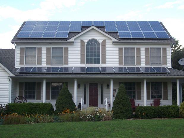 Traditional Home Exterior in Philadelphia - solar panels, double hung ...